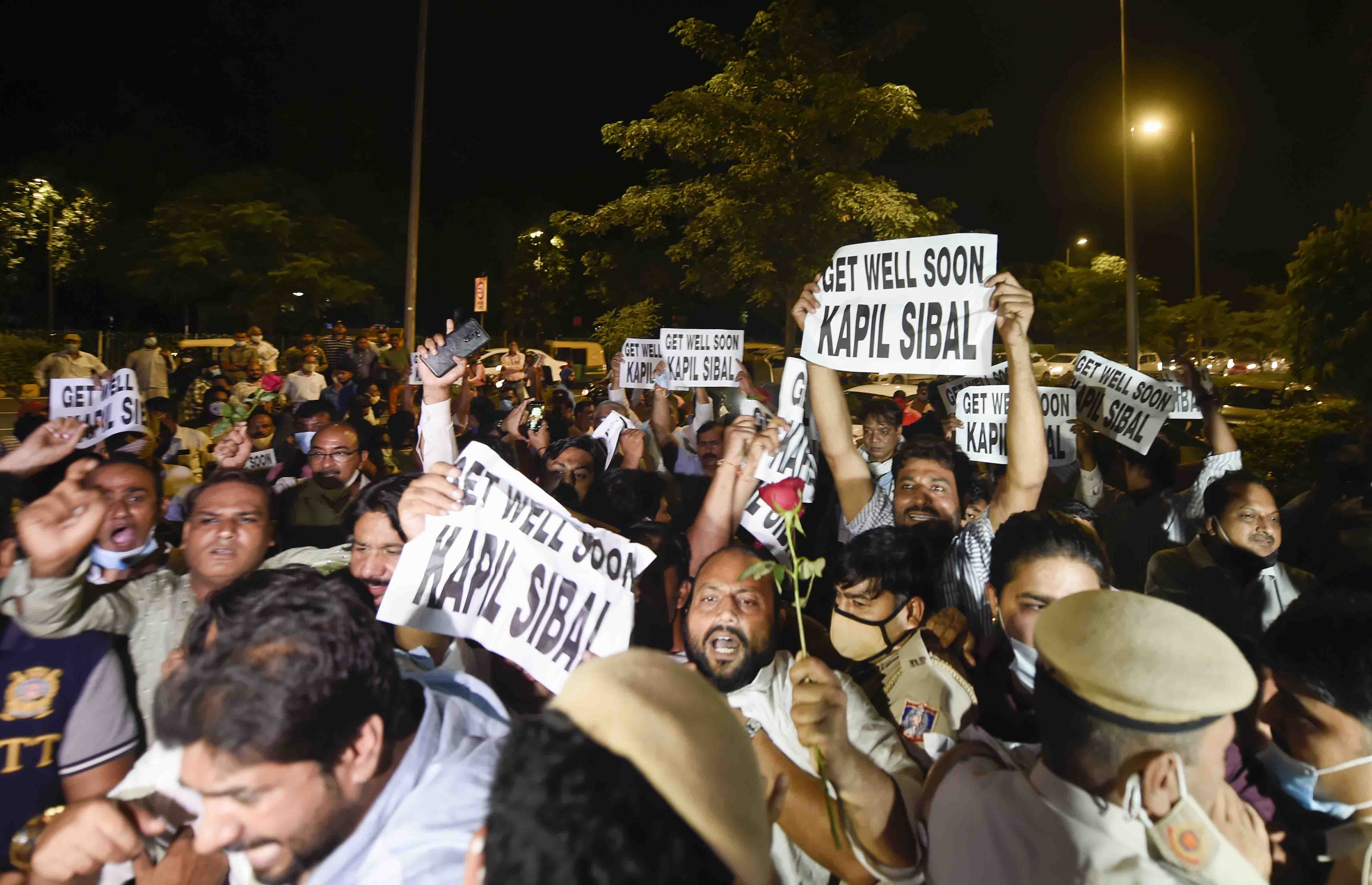 With 'Get Well Soon' placards, Congress workers protest outside Kapil ...