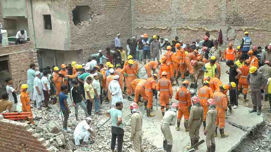 Four dead, several feared trapped after four-storey building collapses ...