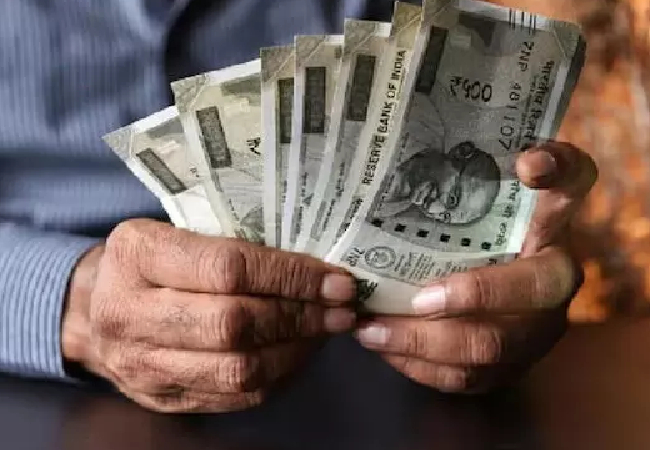 Rupee declines 4 paise to close at 86.72 against US dollar