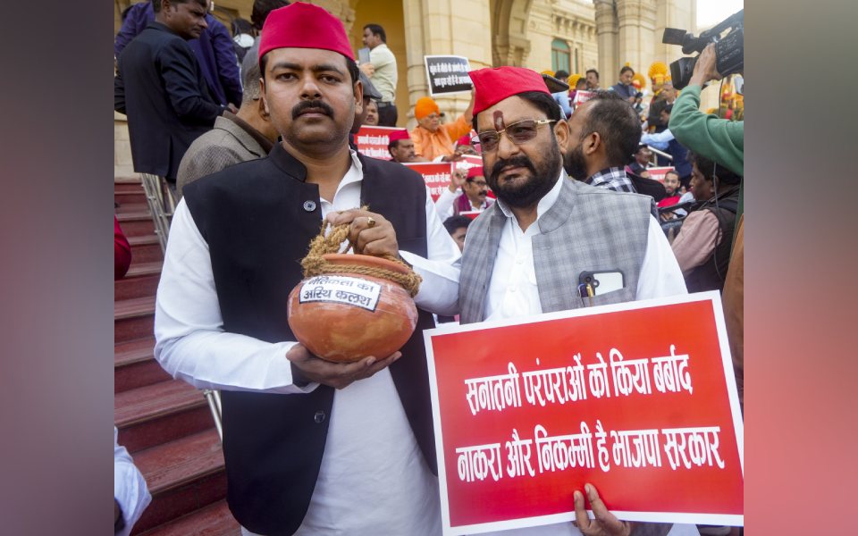 UP MLC carries urn to assembly premises, accuses govt of hiding Kumbh ...