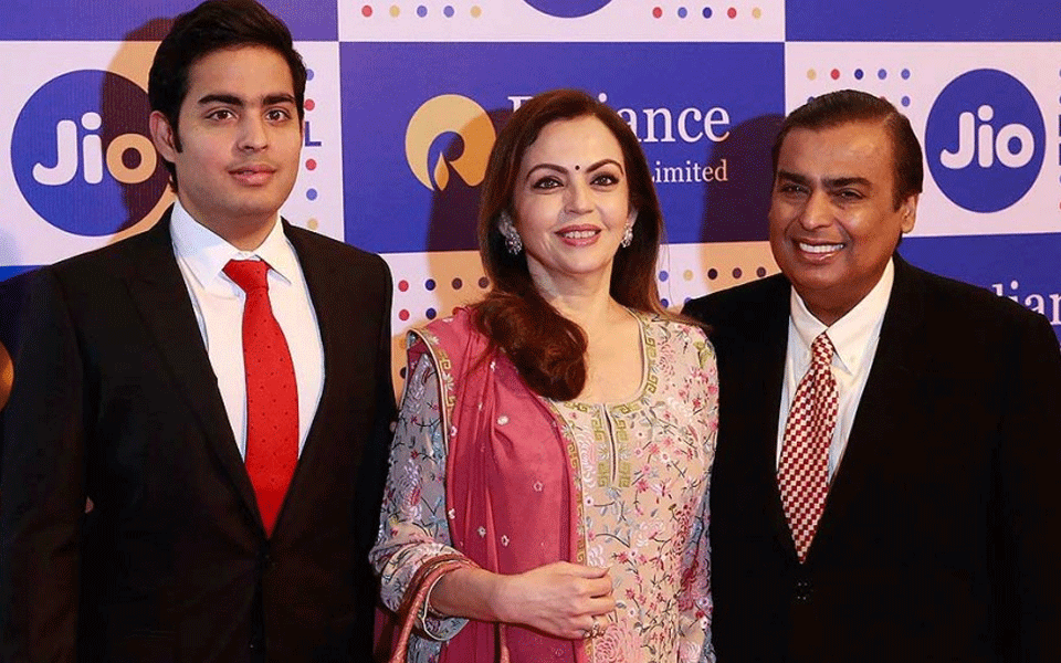 Tale of 2 Ambanis: Dad backs Congress man, son attends Modi rally