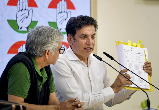 Cong demands scope of probe into 'liquor scam' be widened to include ...