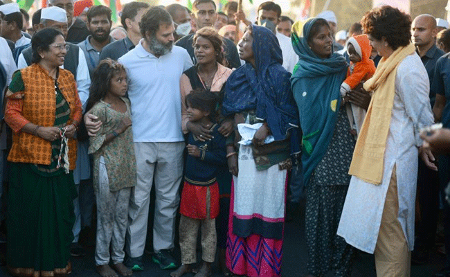 Woman ragpicker shares her woes with Rahul Gandhi in MP town during his ...