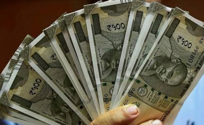 Rupee plunges 14 paise to close at record low of 87.57 against US dollar