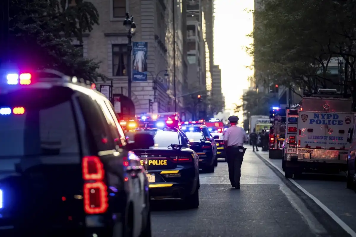 Gunman kills four, including police officer, in shooting at New York ...